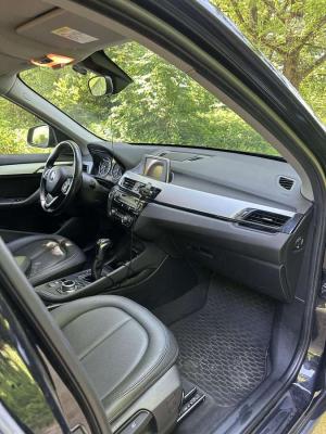 Black BMW X1 2016 in Kaunas, with an engine capacity of 2.00 L and mileage of 287 thousand km for 12500 €, photo 14 on AUTOMOTO.COM.LV