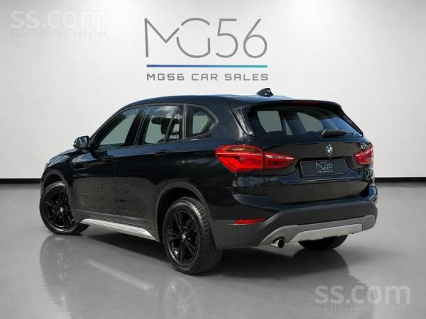 Black BMW X1 2016 in Riga, with an engine capacity of 2.00 L and mileage of 174 thousand km for 13990 €, photo 4 on AUTOMOTO.COM.LV