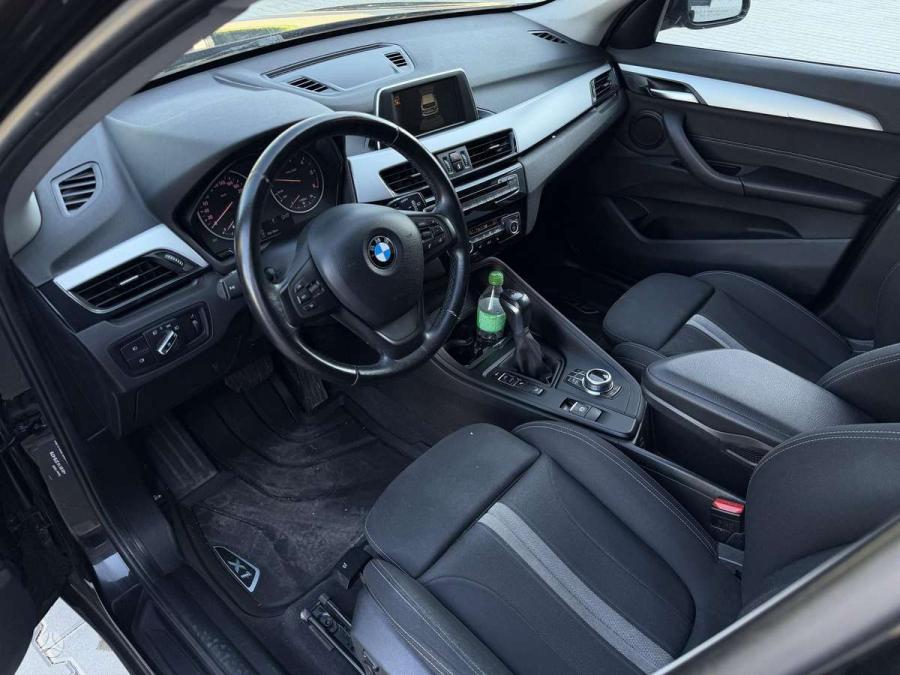 Black BMW X1 2016 in Utena, with an engine capacity of 2.00 L and mileage of 290 thousand km for 10950 €, photo 15 on AUTOMOTO.COM.LV