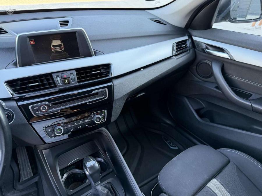 Black BMW X1 2016 in Utena, with an engine capacity of 2.00 L and mileage of 290 thousand km for 10950 €, photo 20 on AUTOMOTO.COM.LV