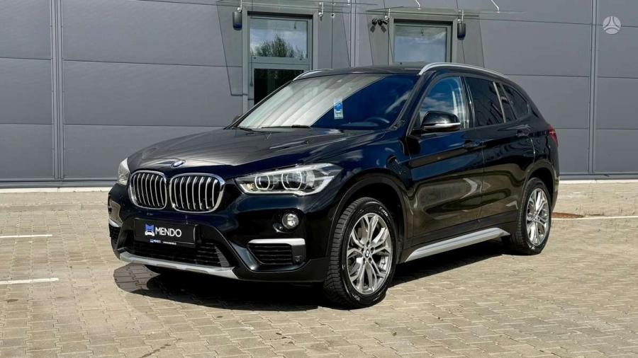 Black BMW X1 2016 in Vilnius, with an engine capacity of 2.00 L and mileage of 199 thousand km for 12590 €, photo 1 on AUTOMOTO.COM.LV