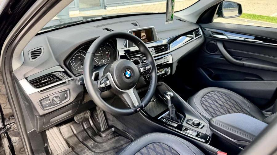 Black BMW X1 2016 in Vilnius, with an engine capacity of 2.00 L and mileage of 199 thousand km for 12590 €, photo 14 on AUTOMOTO.COM.LV