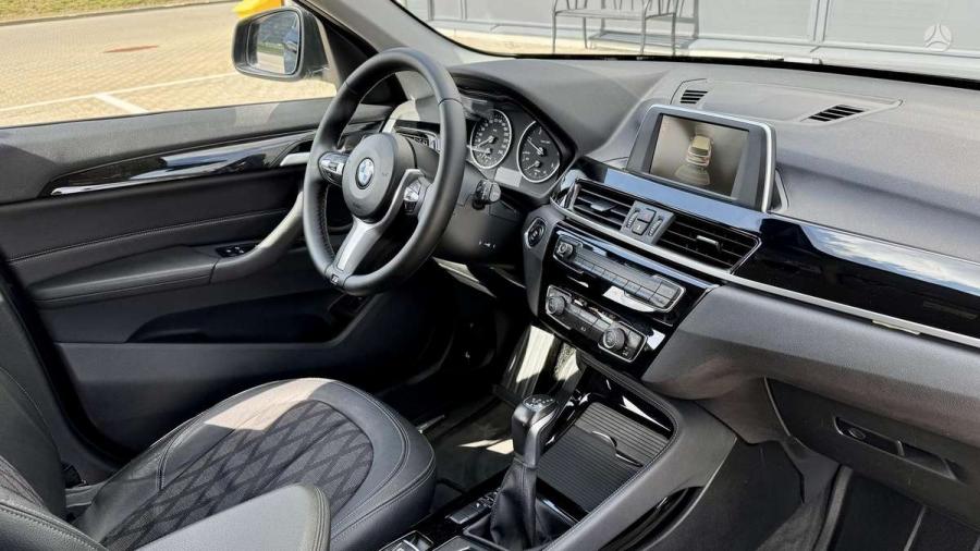 Black BMW X1 2016 in Vilnius, with an engine capacity of 2.00 L and mileage of 199 thousand km for 12590 €, photo 20 on AUTOMOTO.COM.LV