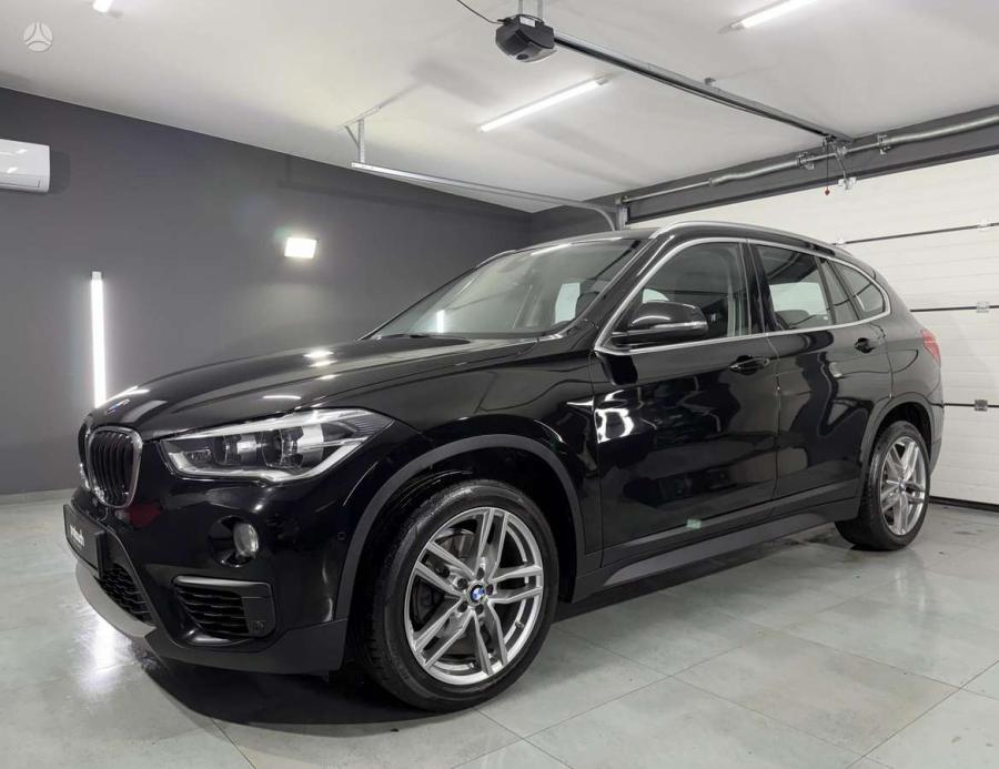 Black BMW X1 2016 in Utena, with an engine capacity of 2.00 L and mileage of 290 thousand km for 11150 €, photo 1 on AUTOMOTO.COM.LV