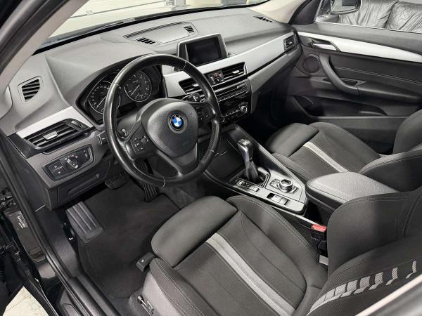 Black BMW X1 2016 in Utena, with an engine capacity of 2.00 L and mileage of 290 thousand km for 11150 €, photo 5 on AUTOMOTO.COM.LV