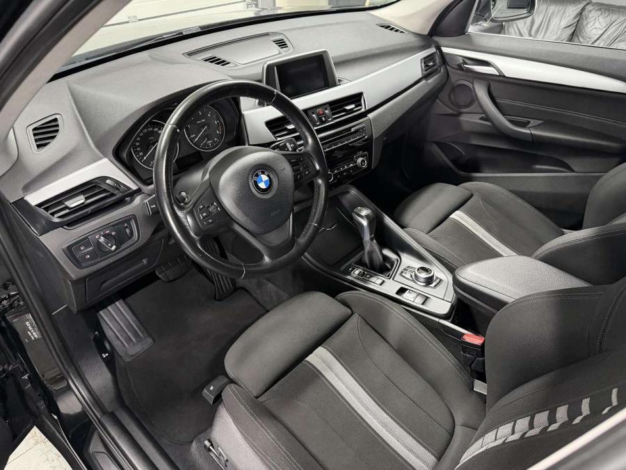 Black BMW X1 2016 in Utena, with an engine capacity of 2.00 L and mileage of 290 thousand km for 11150 €, photo 6 on AUTOMOTO.COM.LV