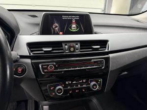 Black BMW X1 2016 in Utena, with an engine capacity of 2.00 L and mileage of 290 thousand km for 11150 €, photo 14 on AUTOMOTO.COM.LV