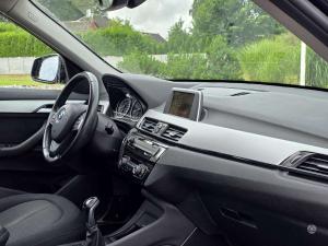 Black BMW X1 2016 in Taurage, with an engine capacity of 2.00 L and mileage of 300 thousand km for 7490 €, photo 14 on AUTOMOTO.COM.LV