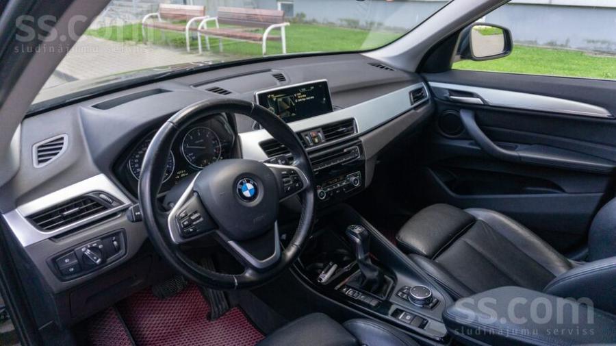Black BMW X1 2016 in Riga, with an engine capacity of 2.00 L and mileage of 251 thousand km for 12990 €, photo 11 on AUTOMOTO.COM.LV