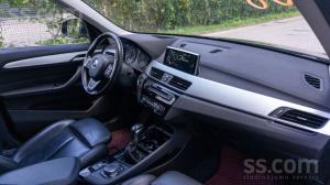 Black BMW X1 2016 in Riga, with an engine capacity of 2.00 L and mileage of 251 thousand km for 12990 €, photo 12 on AUTOMOTO.COM.LV