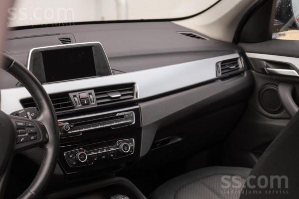 Black BMW X1 2016 in Riga, with an engine capacity of 2.00 L and mileage of 164 thousand km for 9995 €, photo 11 on AUTOMOTO.COM.LV