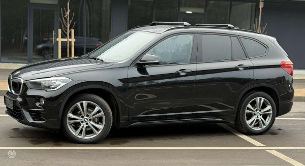 Black BMW X1 2017 in Utena, with an engine capacity of 2.00 L and mileage of 260 thousand km for 11350 €, photo 8 on AUTOMOTO.COM.LV