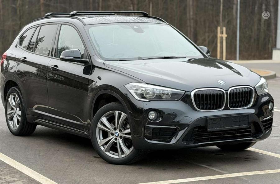 Black BMW X1 2017 in Utena, with an engine capacity of 2.00 L and mileage of 261 thousand km for 11200 €, photo 1 on AUTOMOTO.COM.LV