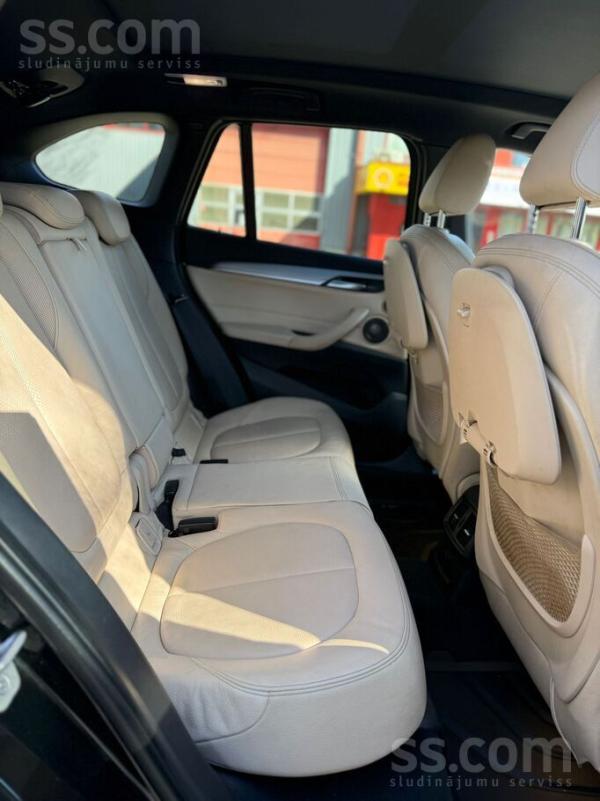 Black BMW X1 2017 in Riga, with an engine capacity of 2.00 L and mileage of 266 thousand km for 17000 €, photo 5 on AUTOMOTO.COM.LV