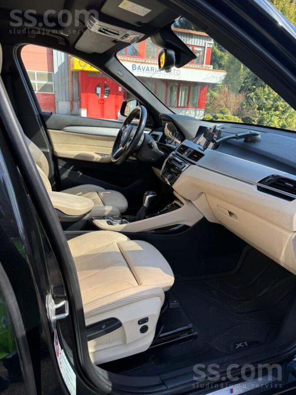 Black BMW X1 2017 in Riga, with an engine capacity of 2.00 L and mileage of 266 thousand km for 17000 €, photo 6 on AUTOMOTO.COM.LV