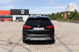 Black BMW X1 2017 in Riga, with an engine capacity of 2.00 L and mileage of 254 thousand km for 15290 €, photo 6 on AUTOMOTO.COM.LV