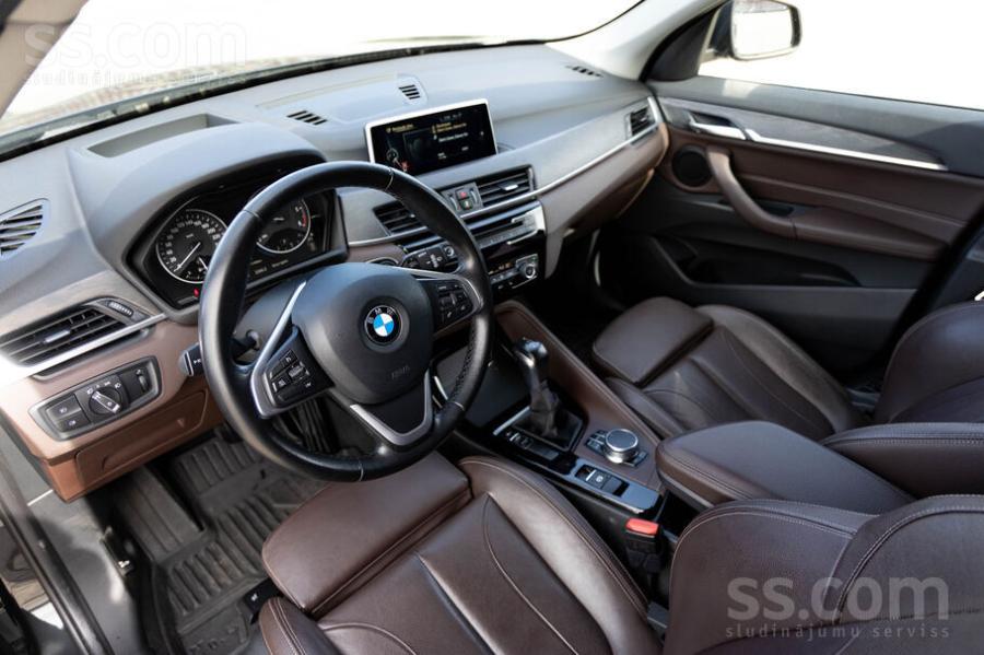 Black BMW X1 2017 in Riga, with an engine capacity of 2.00 L and mileage of 254 thousand km for 15290 €, photo 8 on AUTOMOTO.COM.LV