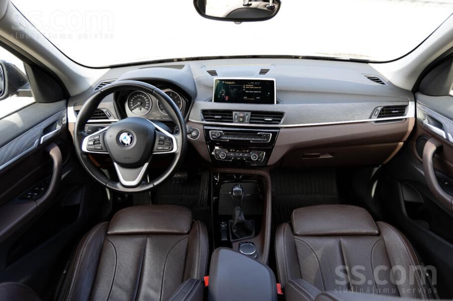 Black BMW X1 2017 in Riga, with an engine capacity of 2.00 L and mileage of 254 thousand km for 15290 €, photo 9 on AUTOMOTO.COM.LV