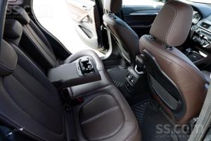 Black BMW X1 2017 in Riga, with an engine capacity of 2.00 L and mileage of 254 thousand km for 15290 €, photo 10 on AUTOMOTO.COM.LV