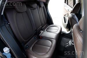 Black BMW X1 2017 in Riga, with an engine capacity of 2.00 L and mileage of 254 thousand km for 15290 €, photo 11 on AUTOMOTO.COM.LV