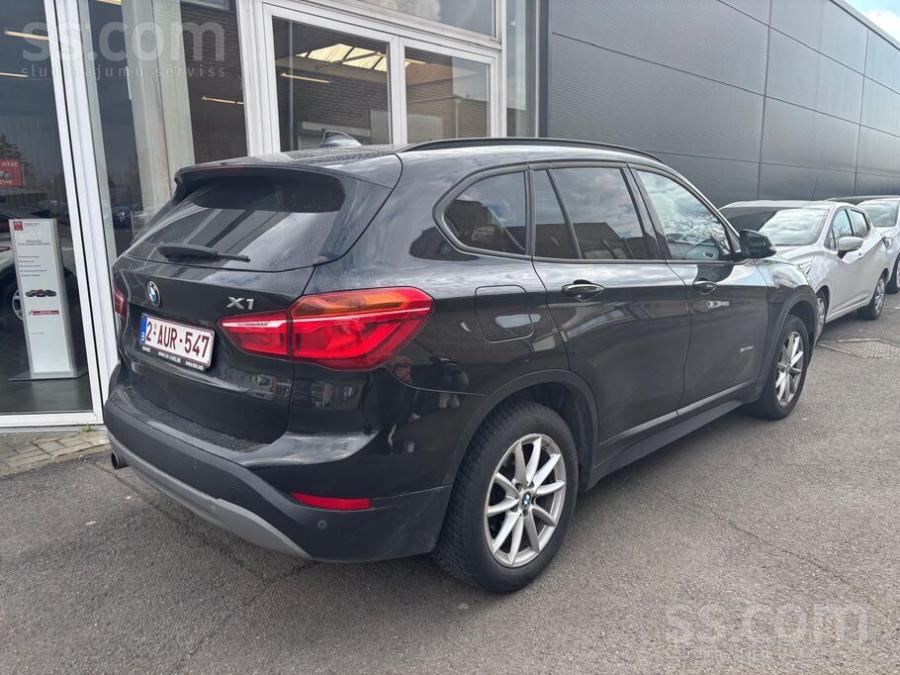Black BMW X1 2017 in Riga, with an engine capacity of 1.50 L and mileage of 0 thousand km for 12950 €, photo 4 on AUTOMOTO.COM.LV