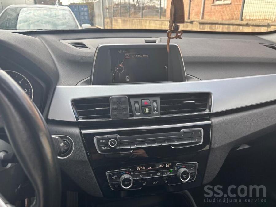 Black BMW X1 2017 in Riga, with an engine capacity of 1.50 L and mileage of 0 thousand km for 12950 €, photo 7 on AUTOMOTO.COM.LV