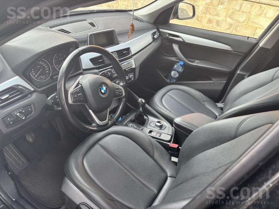Black BMW X1 2017 in Riga, with an engine capacity of 1.50 L and mileage of 0 thousand km for 12950 €, photo 8 on AUTOMOTO.COM.LV