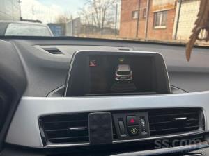 Black BMW X1 2017 in Riga, with an engine capacity of 1.50 L and mileage of 0 thousand km for 12950 €, photo 9 on AUTOMOTO.COM.LV