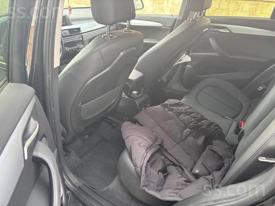 Black BMW X1 2017 in Riga, with an engine capacity of 1.50 L and mileage of 0 thousand km for 12950 €, photo 10 on AUTOMOTO.COM.LV
