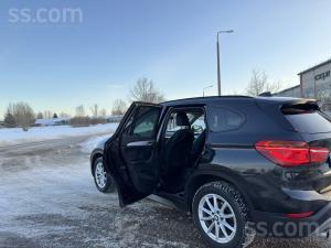 Black BMW X1 2017 in Cesis, with an engine capacity of 1.50 L and mileage of 0 thousand km for 11900 €, photo 12 on AUTOMOTO.COM.LV