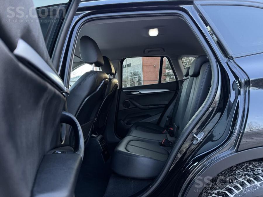 Black BMW X1 2017 in Cesis, with an engine capacity of 1.50 L and mileage of 0 thousand km for 11900 €, photo 13 on AUTOMOTO.COM.LV