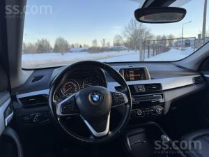 Black BMW X1 2017 in Cesis, with an engine capacity of 1.50 L and mileage of 0 thousand km for 11900 €, photo 14 on AUTOMOTO.COM.LV