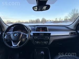 Black BMW X1 2017 in Cesis, with an engine capacity of 1.50 L and mileage of 0 thousand km for 11900 €, photo 16 on AUTOMOTO.COM.LV
