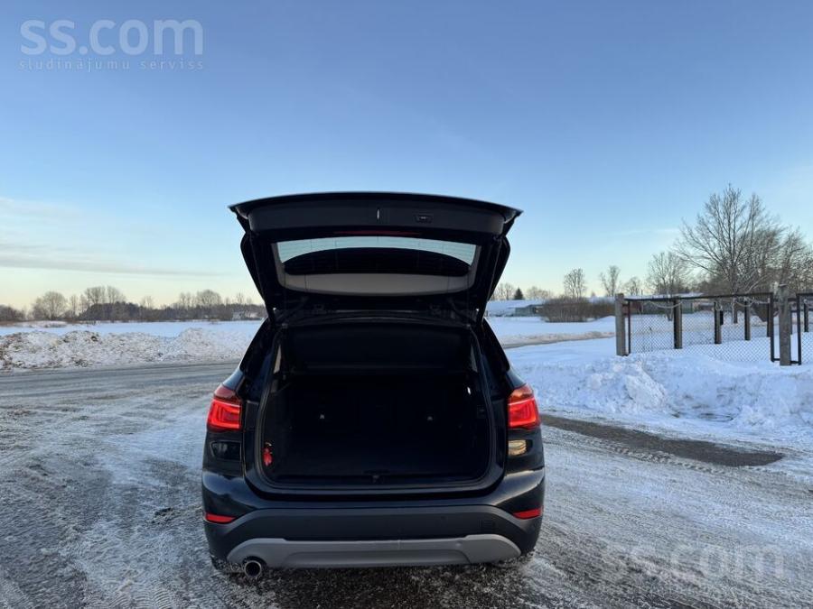 Black BMW X1 2017 in Cesis, with an engine capacity of 1.50 L and mileage of 0 thousand km for 11900 €, photo 18 on AUTOMOTO.COM.LV