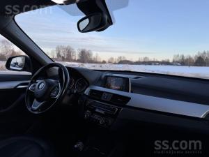 Black BMW X1 2017 in Cesis, with an engine capacity of 1.50 L and mileage of 0 thousand km for 11900 €, photo 22 on AUTOMOTO.COM.LV