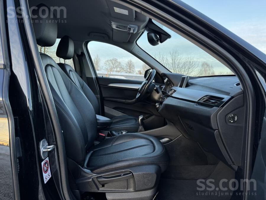 Black BMW X1 2017 in Cesis, with an engine capacity of 1.50 L and mileage of 0 thousand km for 11900 €, photo 24 on AUTOMOTO.COM.LV