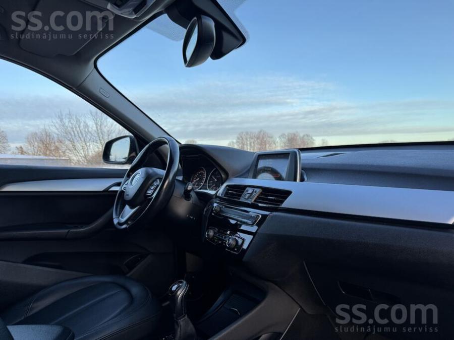 Black BMW X1 2017 in Cesis, with an engine capacity of 1.50 L and mileage of 0 thousand km for 11900 €, photo 26 on AUTOMOTO.COM.LV