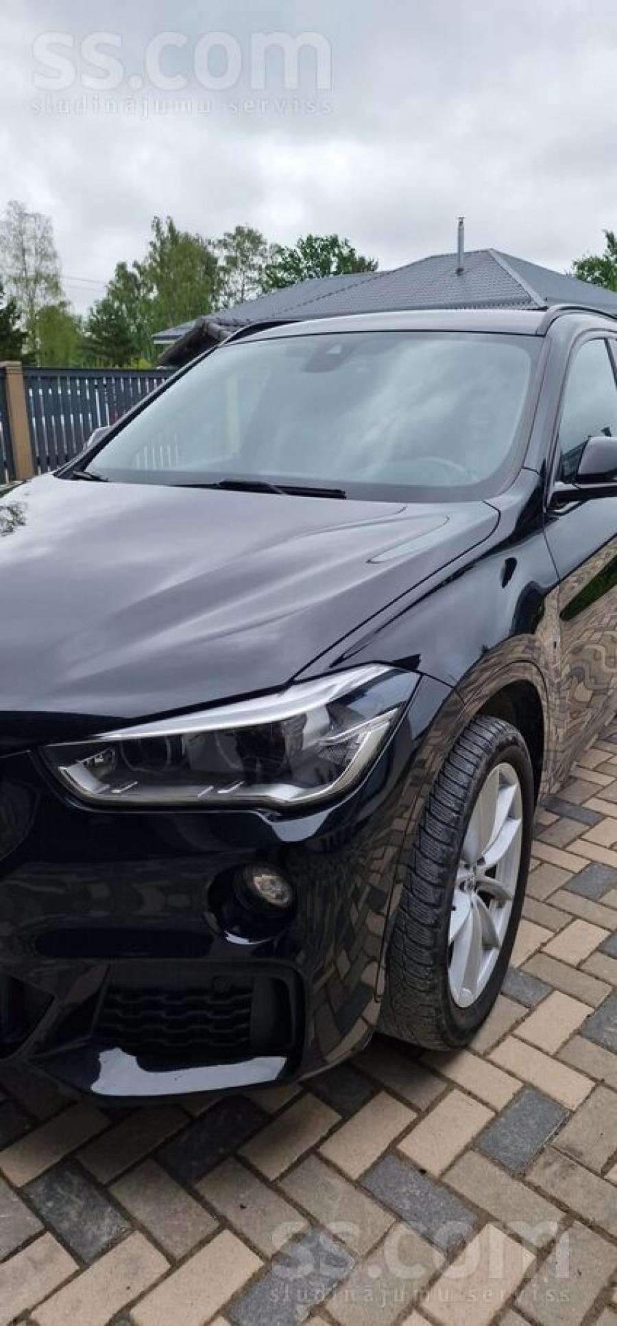 Black BMW X1 2017 in Riga, with an engine capacity of 2.00 L and mileage of 210 thousand km for 17500 €, photo 6 on AUTOMOTO.COM.LV