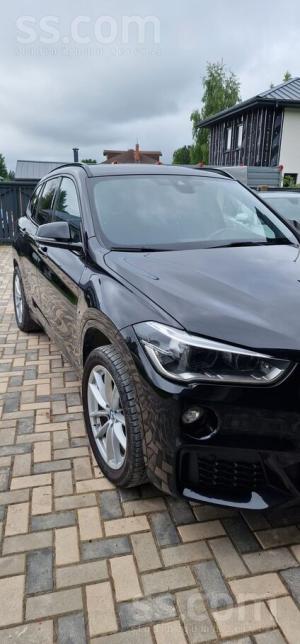 Black BMW X1 2017 in Riga, with an engine capacity of 2.00 L and mileage of 210 thousand km for 17500 €, photo 7 on AUTOMOTO.COM.LV