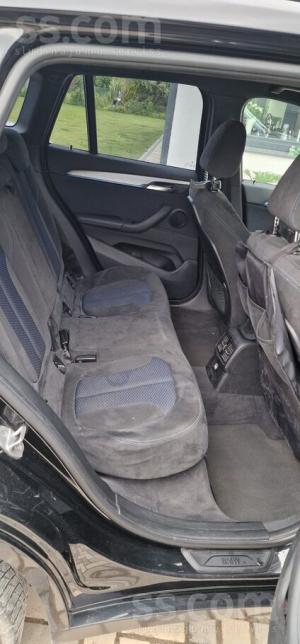 Black BMW X1 2017 in Riga, with an engine capacity of 2.00 L and mileage of 210 thousand km for 17500 €, photo 8 on AUTOMOTO.COM.LV