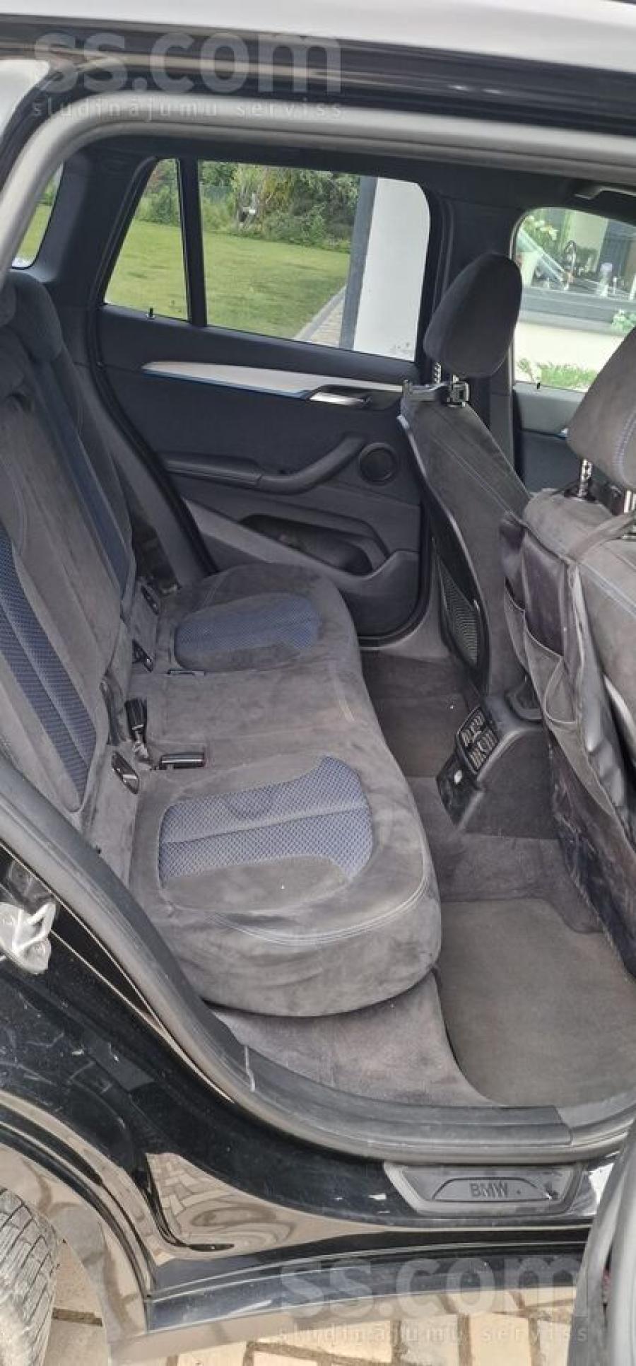 Black BMW X1 2017 in Riga, with an engine capacity of 2.00 L and mileage of 210 thousand km for 17500 €, photo 8 on AUTOMOTO.COM.LV