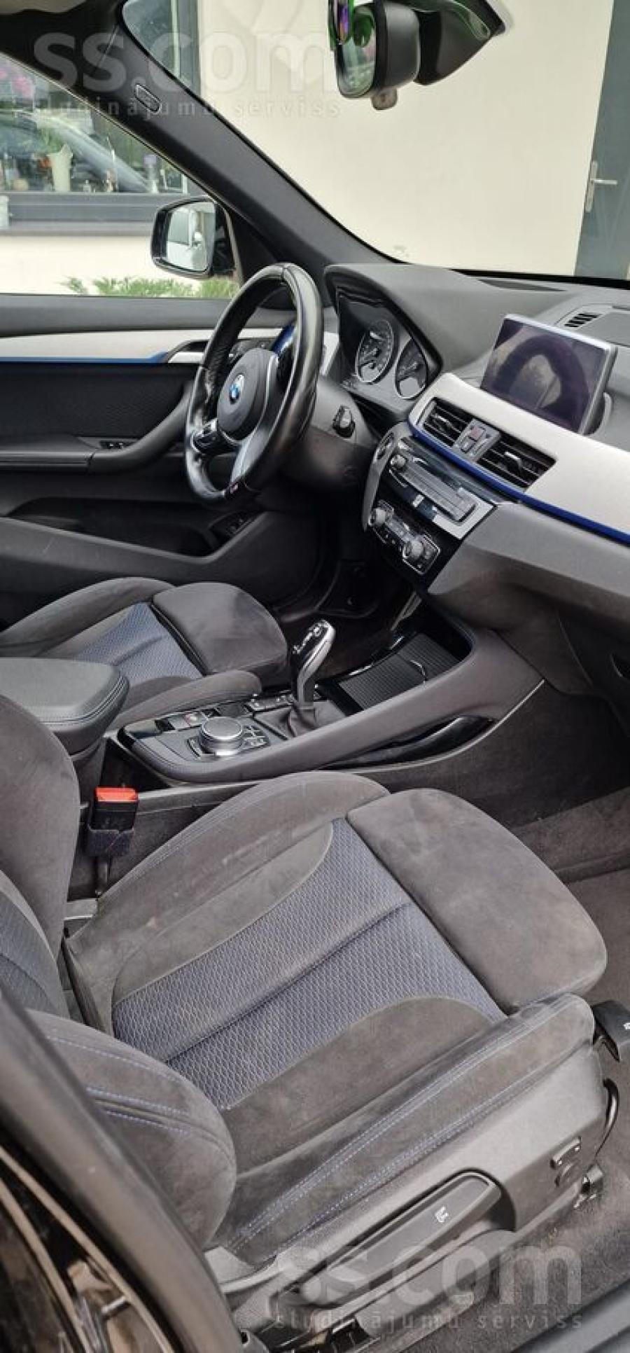 Black BMW X1 2017 in Riga, with an engine capacity of 2.00 L and mileage of 210 thousand km for 17500 €, photo 9 on AUTOMOTO.COM.LV