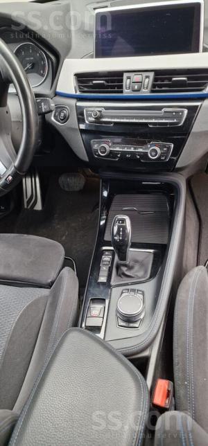 Black BMW X1 2017 in Riga, with an engine capacity of 2.00 L and mileage of 210 thousand km for 17500 €, photo 10 on AUTOMOTO.COM.LV