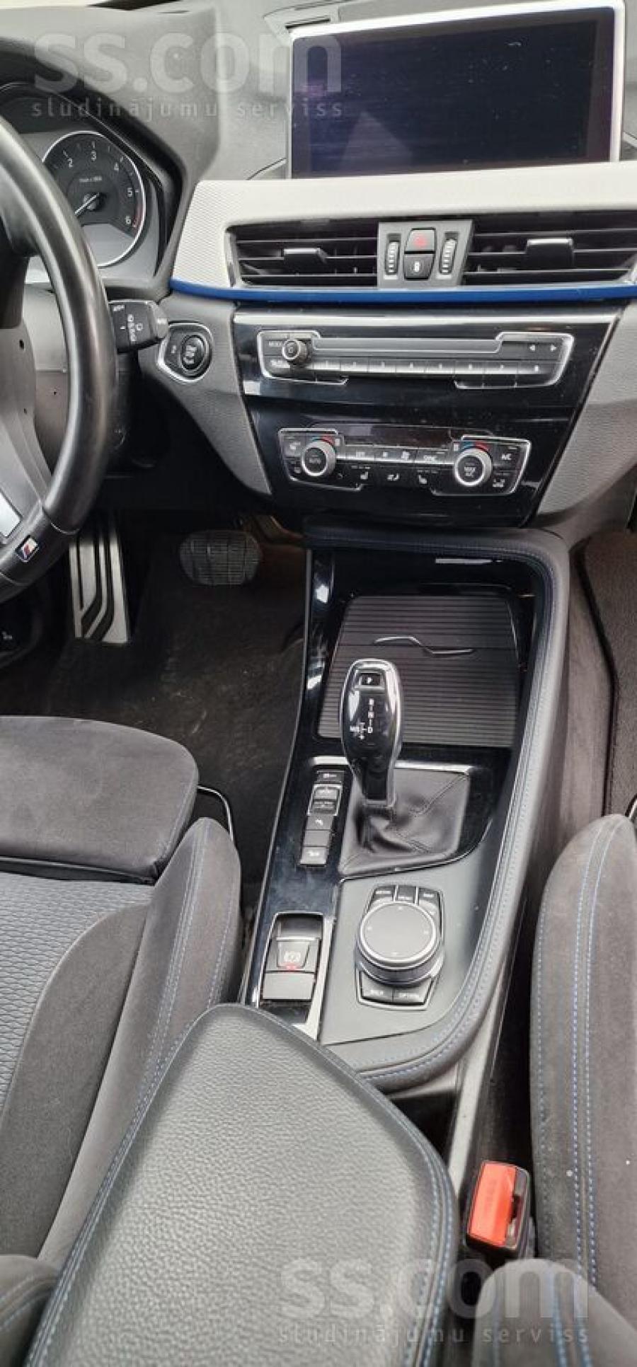 Black BMW X1 2017 in Riga, with an engine capacity of 2.00 L and mileage of 210 thousand km for 17500 €, photo 10 on AUTOMOTO.COM.LV