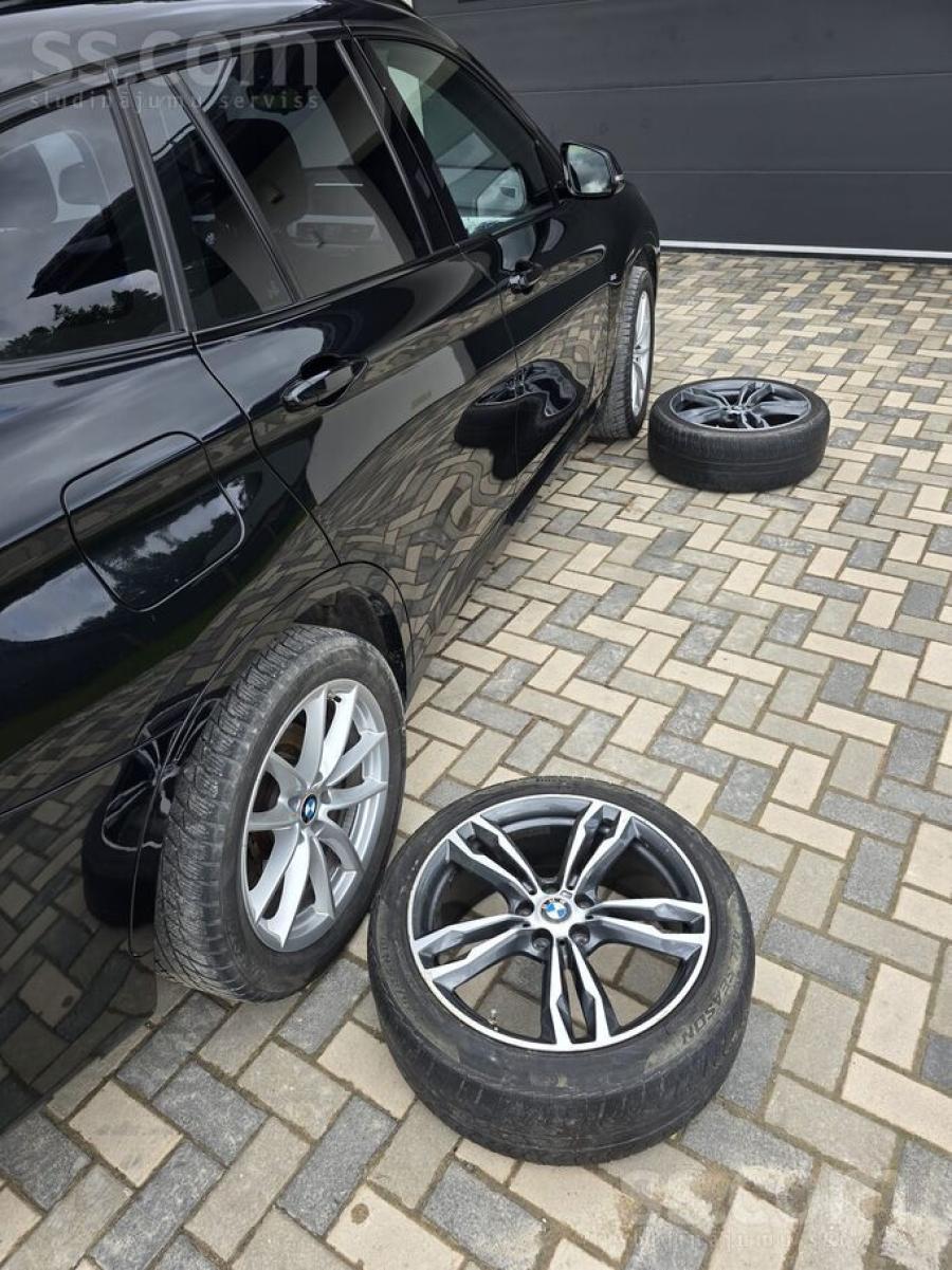 Black BMW X1 2017 in Riga, with an engine capacity of 2.00 L and mileage of 210 thousand km for 17500 €, photo 12 on AUTOMOTO.COM.LV