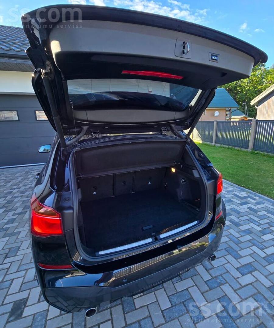 Black BMW X1 2017 in Riga, with an engine capacity of 2.00 L and mileage of 210 thousand km for 17500 €, photo 14 on AUTOMOTO.COM.LV