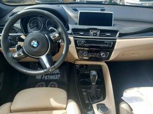 Black BMW X1 2017 in Utena, with an engine capacity of 2.00 L and mileage of 233 thousand km for 13300 €, photo 3 on AUTOMOTO.COM.LV