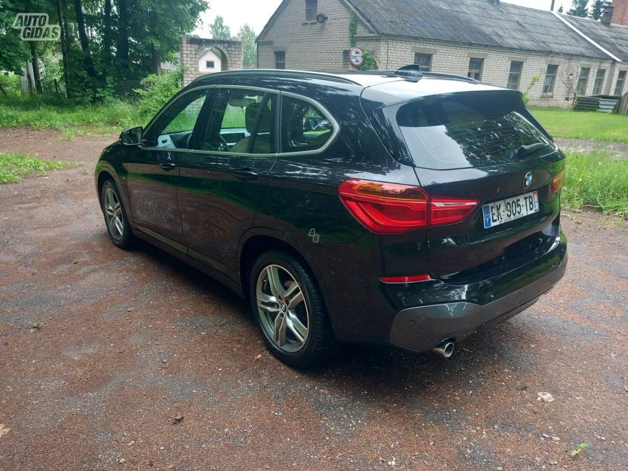 Black BMW X1 2017 in Utena, with an engine capacity of 2.00 L and mileage of 233 thousand km for 13300 €, photo 5 on AUTOMOTO.COM.LV