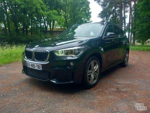 Black BMW X1 2017 in Utena, with an engine capacity of 2.00 L and mileage of 233 thousand km for 13300 €, photo 7 on AUTOMOTO.COM.LV