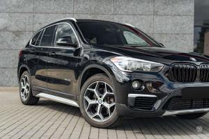 Black BMW X1 2017 in Klaipeda, with an engine capacity of 2.00 L and mileage of 190 thousand km for 13400 €, photo 7 on AUTOMOTO.COM.LV